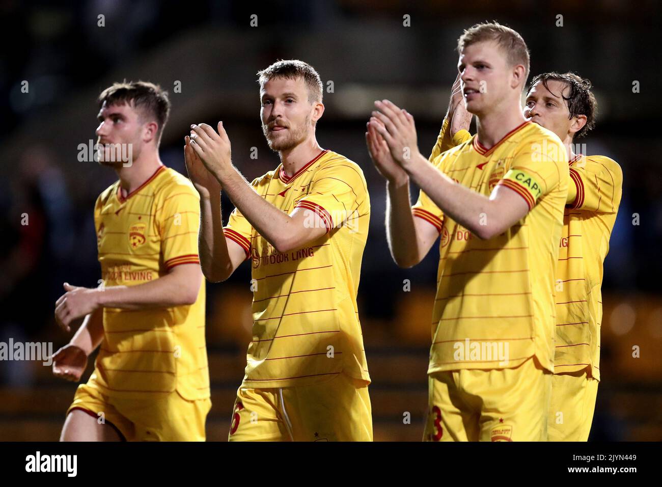 Adelaide players celebrate with their fans at full time during the A ...