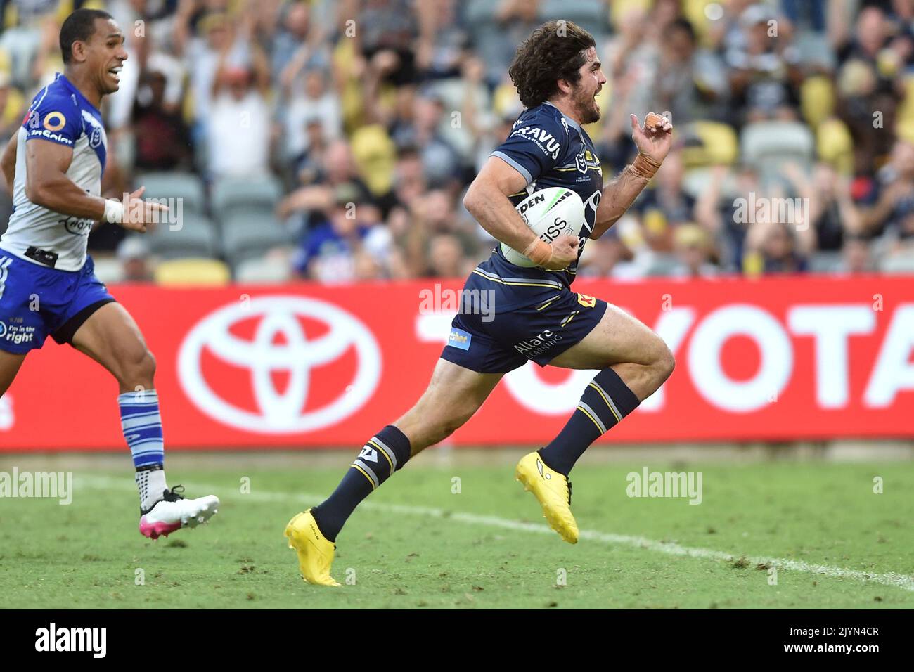 Jake Granville on his way to a try during the Round 6 NRL match between ...