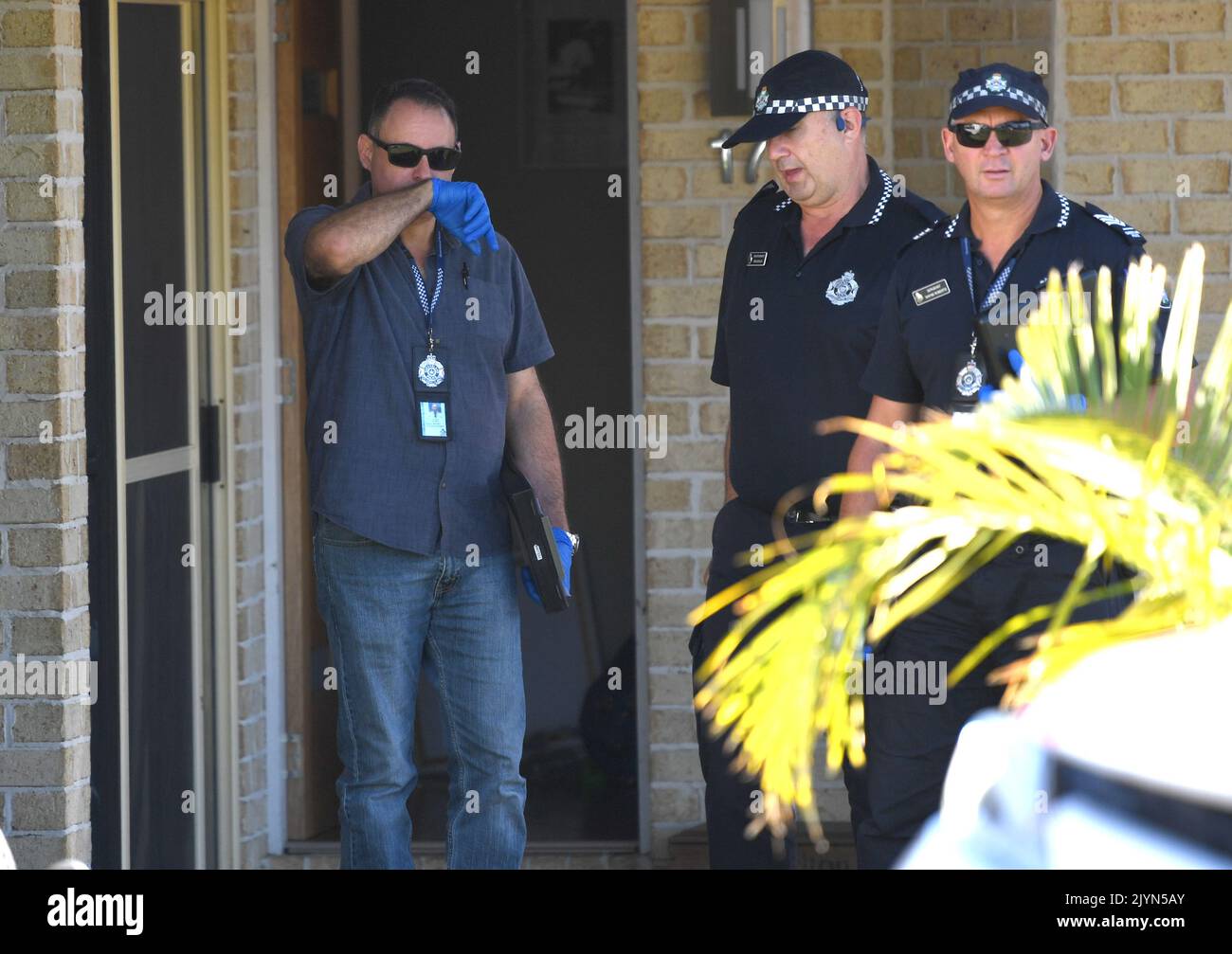 Police work at the home of murder victim Kelly Wilkinson on the Gold ...