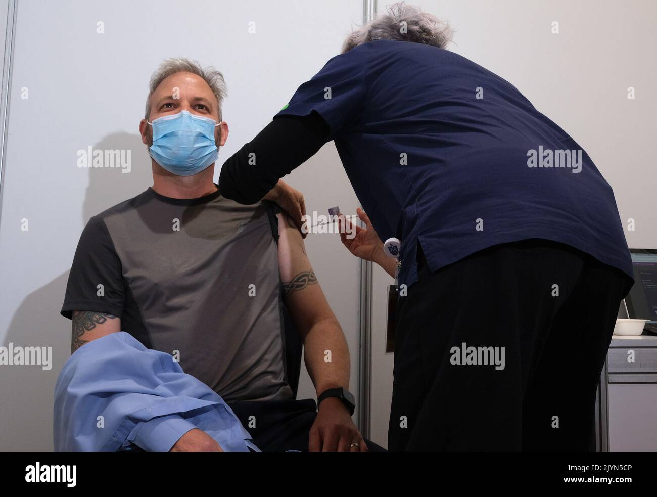 Victorian Chief Health Officer Brett Sutton receives his first COVID-19 ...