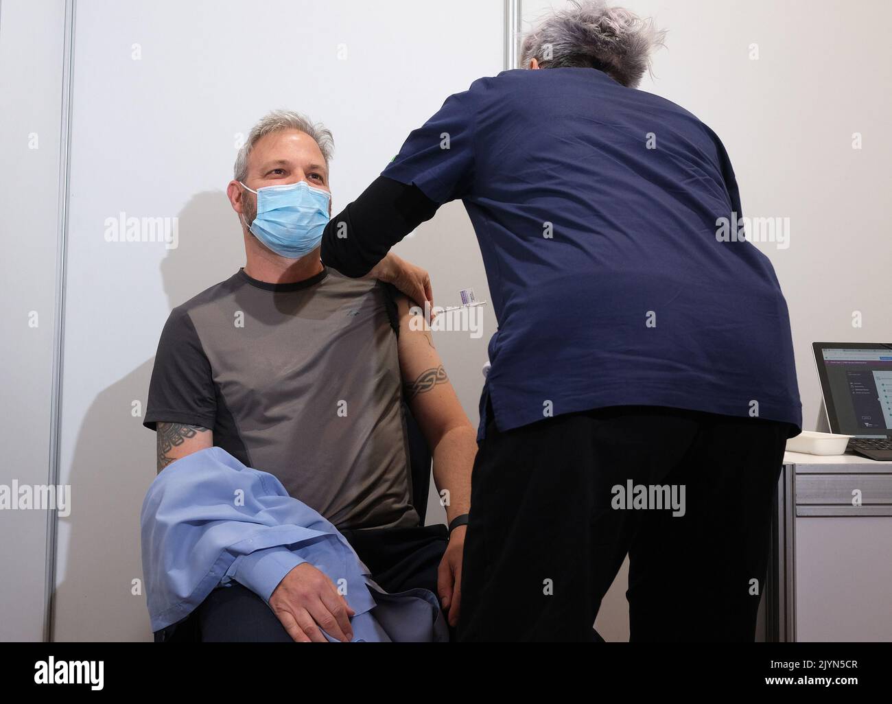 Victorian Chief Health Officer Brett Sutton receives his first COVID-19 ...