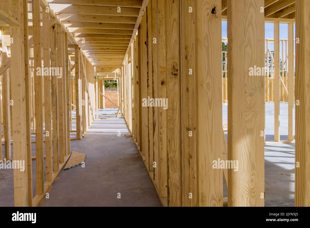 Construction of a new house under construction with wood framing beams a stick framing Stock ...