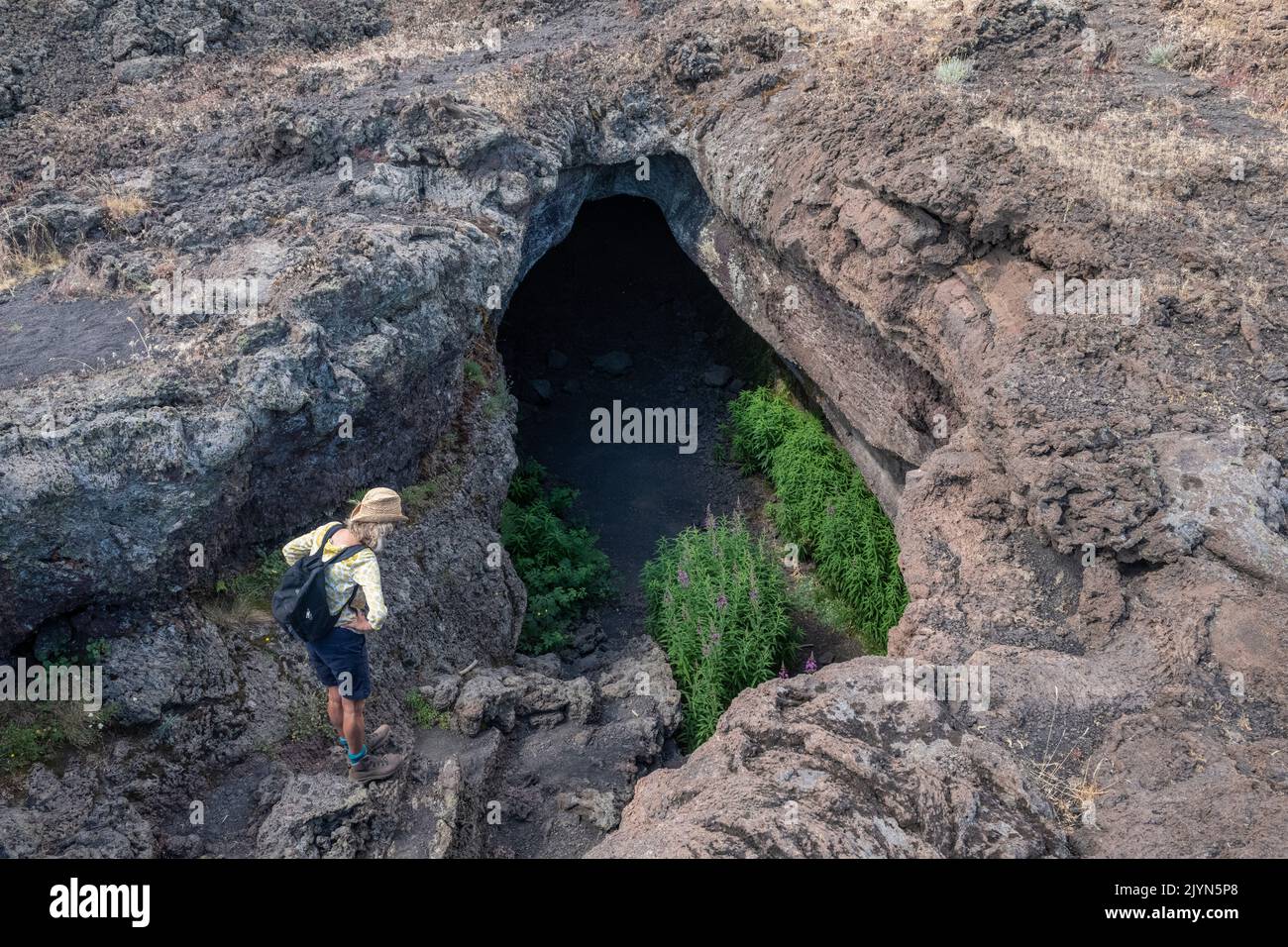 The entrance to the Grotta dei Lamponi (Raspberry Cave) lava cave, or ...
