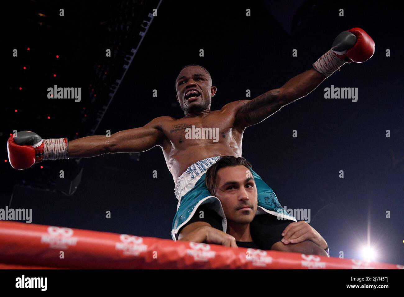 Bruno Tarimo celebrates after beating Kye MacKenzie in their super ...