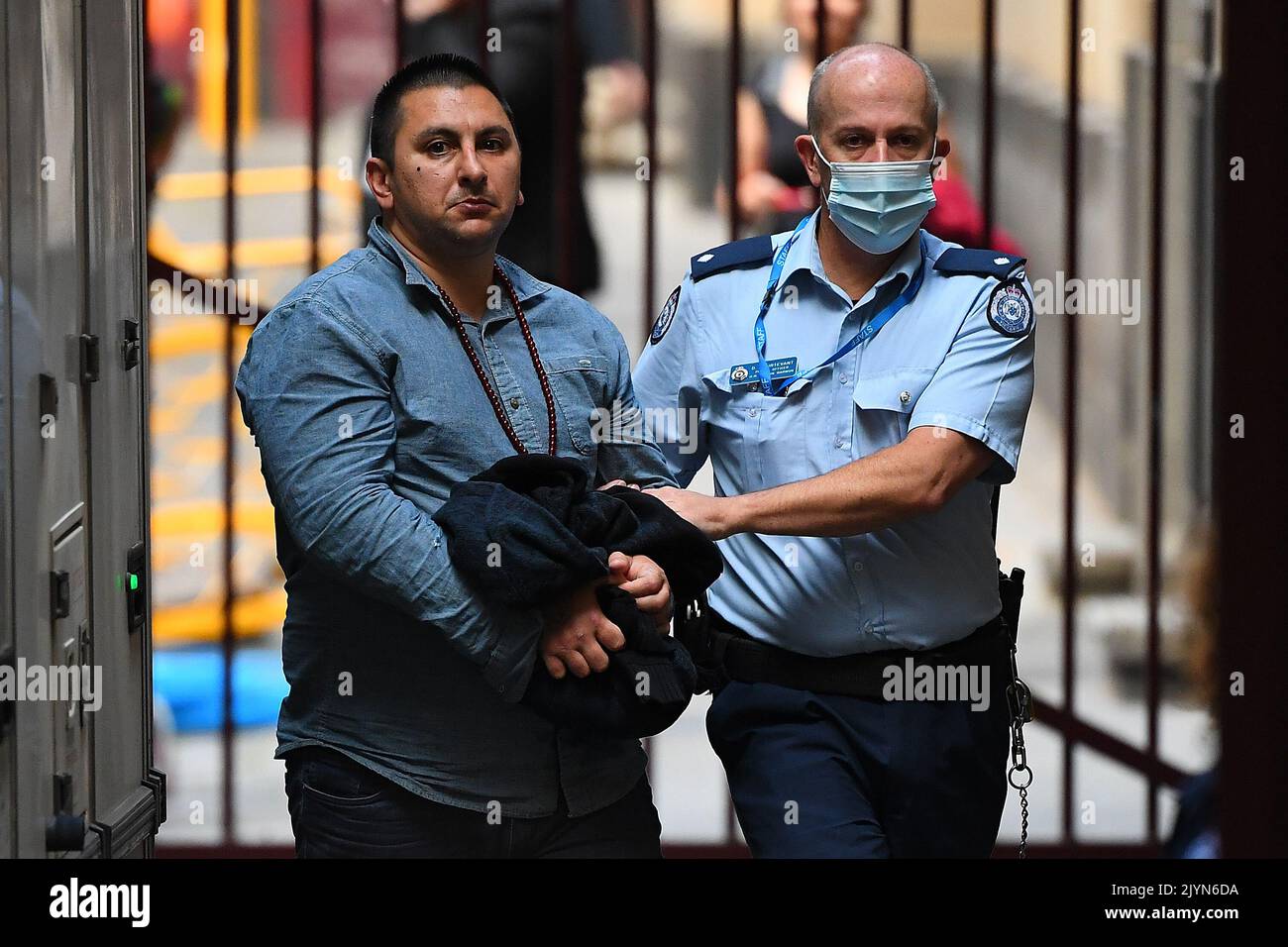 Qasim House (left) arrives to the Supreme Court in Melbourne, Friday ...