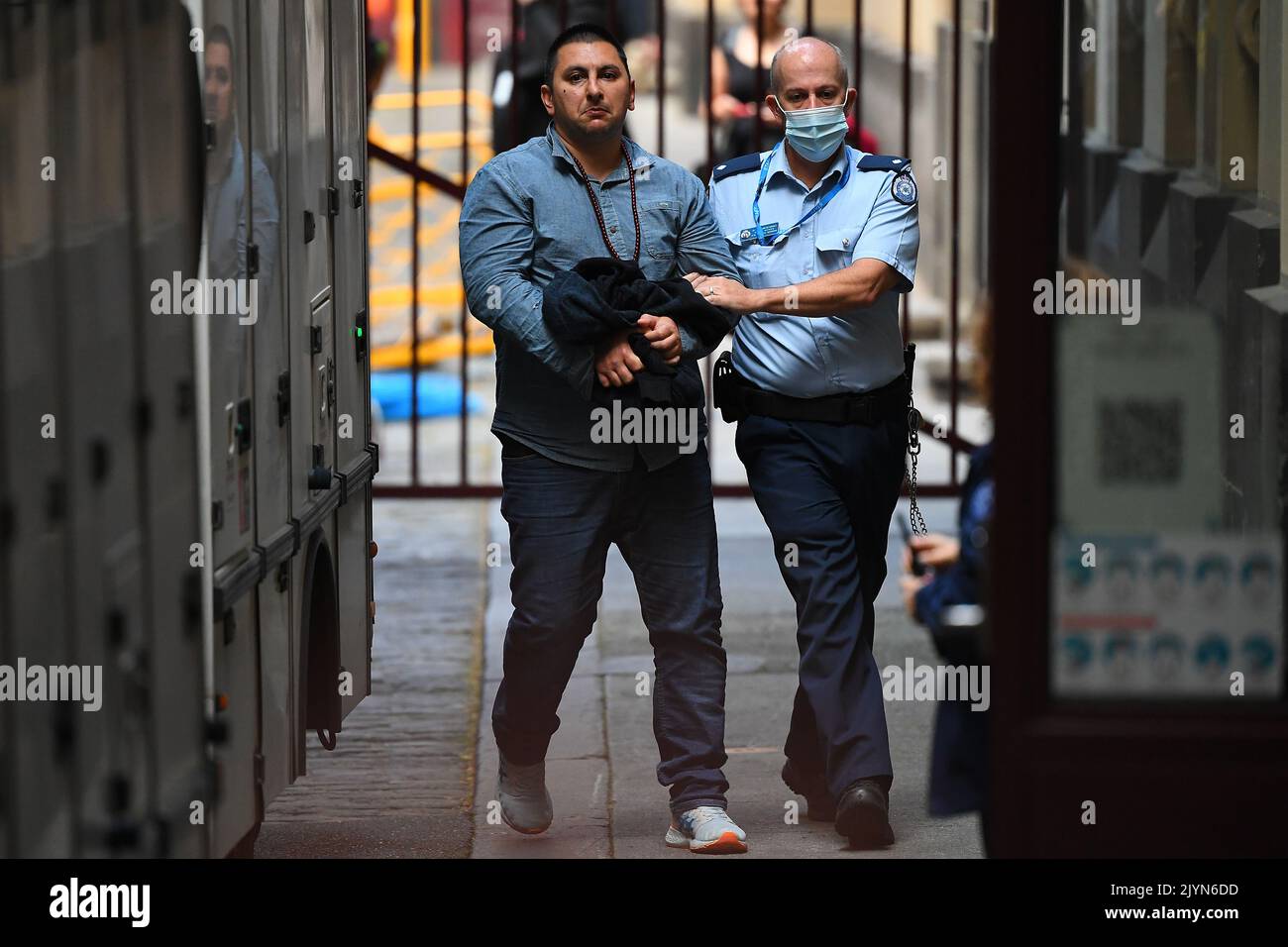Qasim House (left) arrives to the Supreme Court in Melbourne, Friday ...