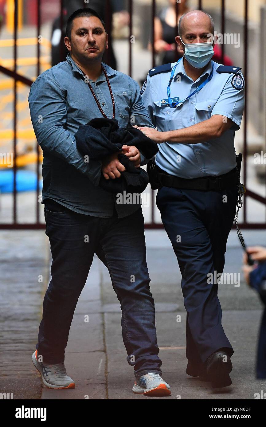 Qasim House (left) arrives to the Supreme Court in Melbourne, Friday ...