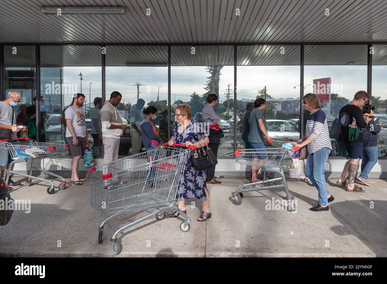 Shoppers are seen queuing at Coles Maylands in Perth, Friday, April 23 ...