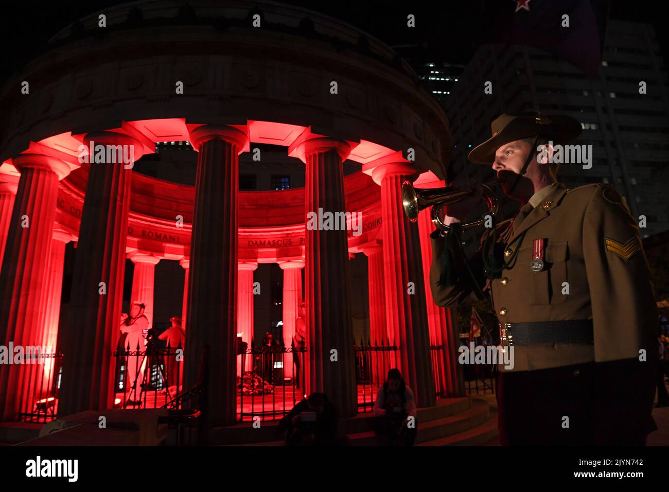 An army bugler is seen playing the last post during the Anzac Day Dawn ...