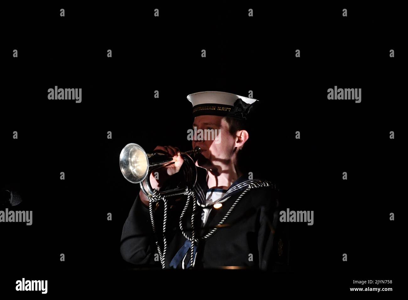 A Navy bugler plays the Last Post during the Anzac Day Dawn Service at ...