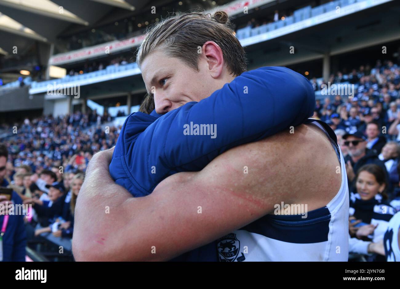 Rhys Stanley of Geelong embraces Geelong Cats head coach Chris Scott at ...