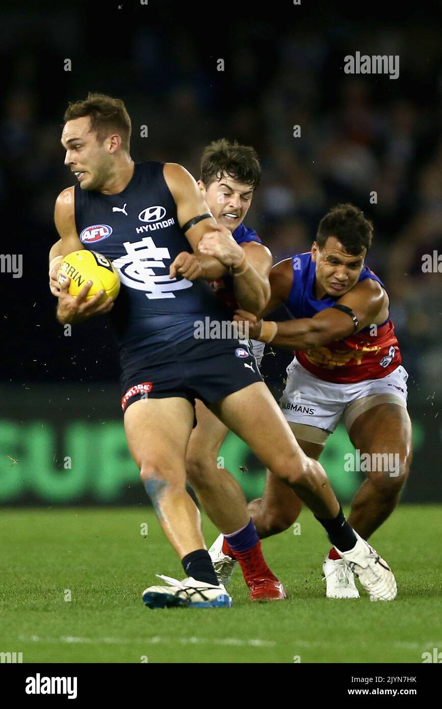 David Cuningham of the Blues is tackled during the Round 6 AFL match ...
