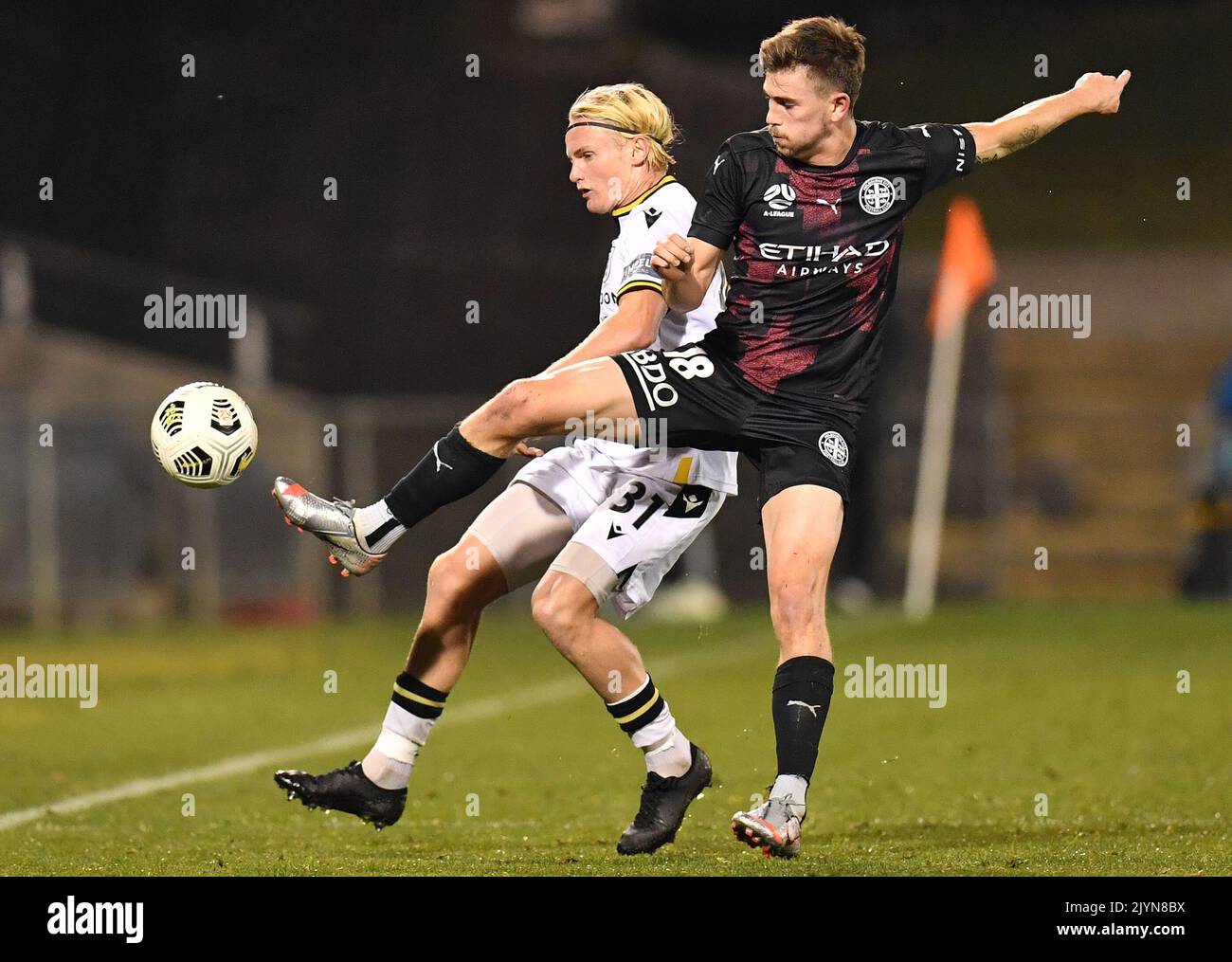 Connor Metcalfe of Melbourne City and Lachlan Rose of Macarthur during ...