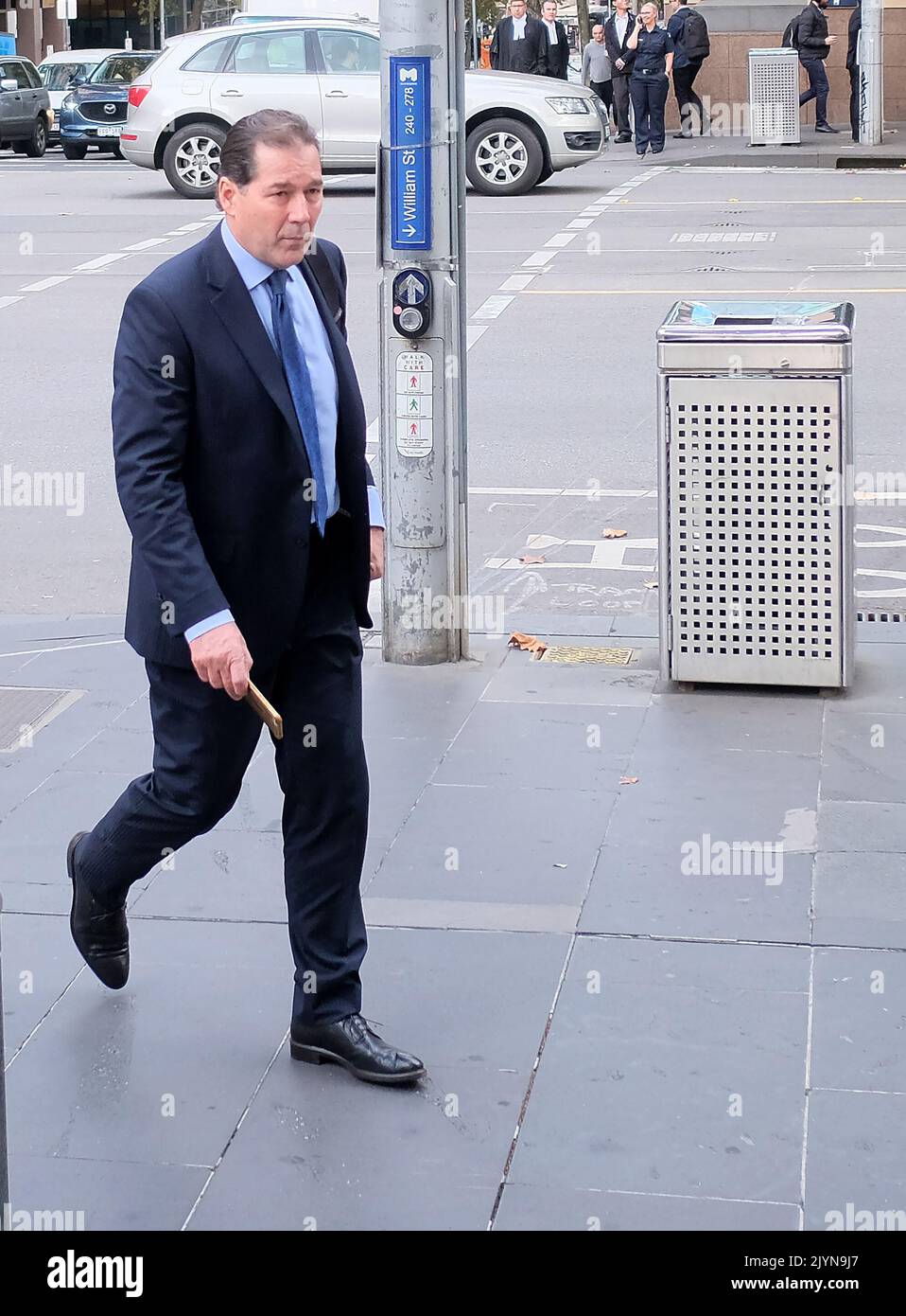 Malcolm Hooper arrives to the County Court of Victoria in Melbourne ...