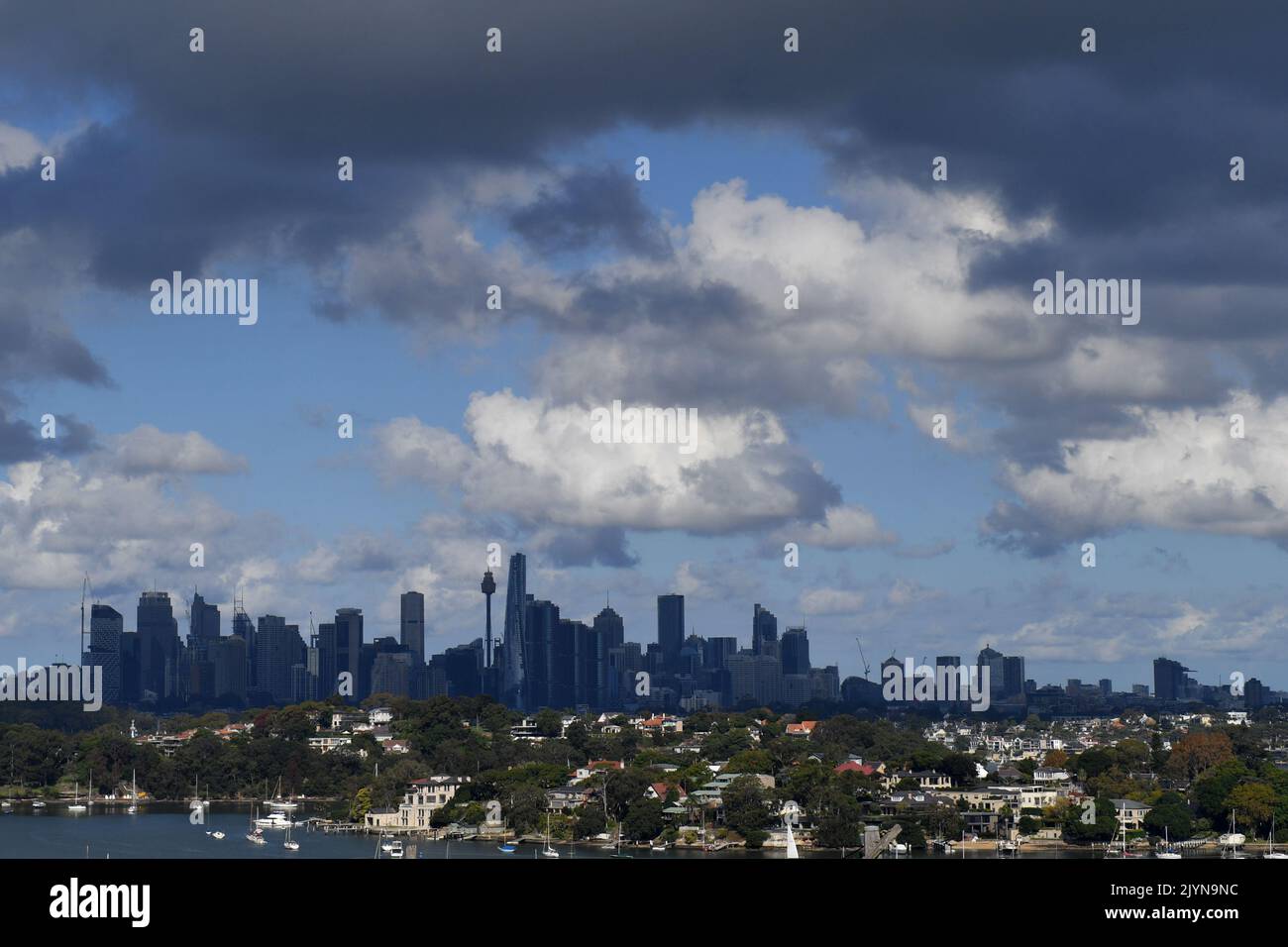 Woolwich peninsula is seen in front of the city skyline in Sydney ...
