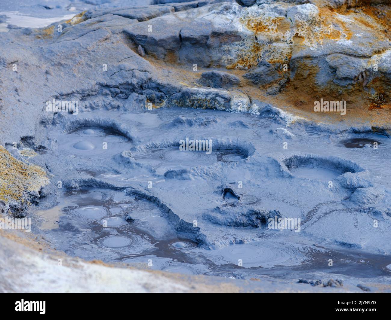 Mudpot or mud pool, geothermal area Hveraroend or Namaskard. Landscape ...