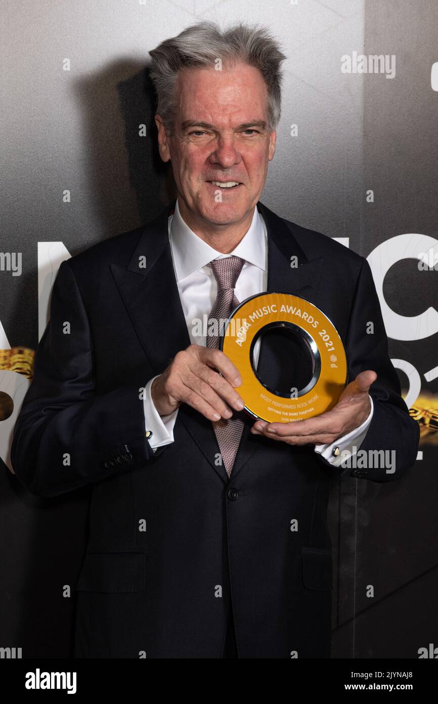 Don Walker holds his award for ‘Most Performed Rock Work’ at The APRA ...