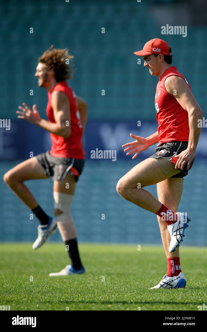 Tom McCartin (right) and Tom Hickey during Sydney Swans AFL training at ...