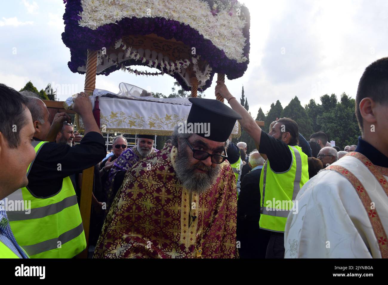 Father John Grillis passes under the Epitaphio (the symbolic funeral ...