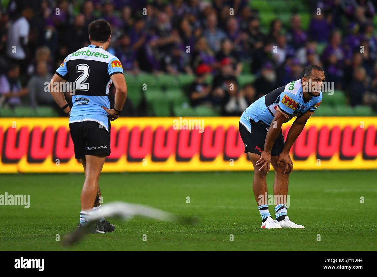 Will Chambers of the Sharks (right) looks dejected after being defeated ...