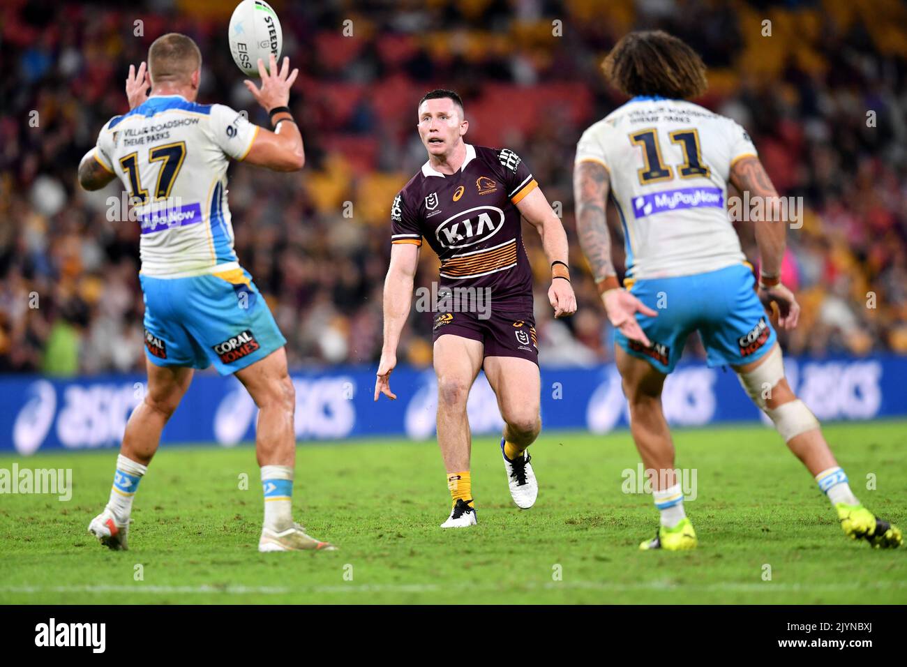 Tyson Gamble (centre) of the Broncos in action during the Round 8 NRL ...