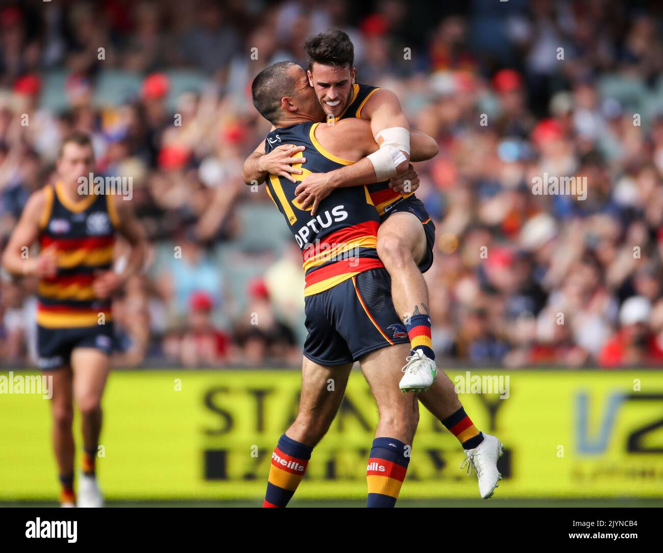 Lachlan Murphy of the Crows celebrates a goal with teammate Taylor ...