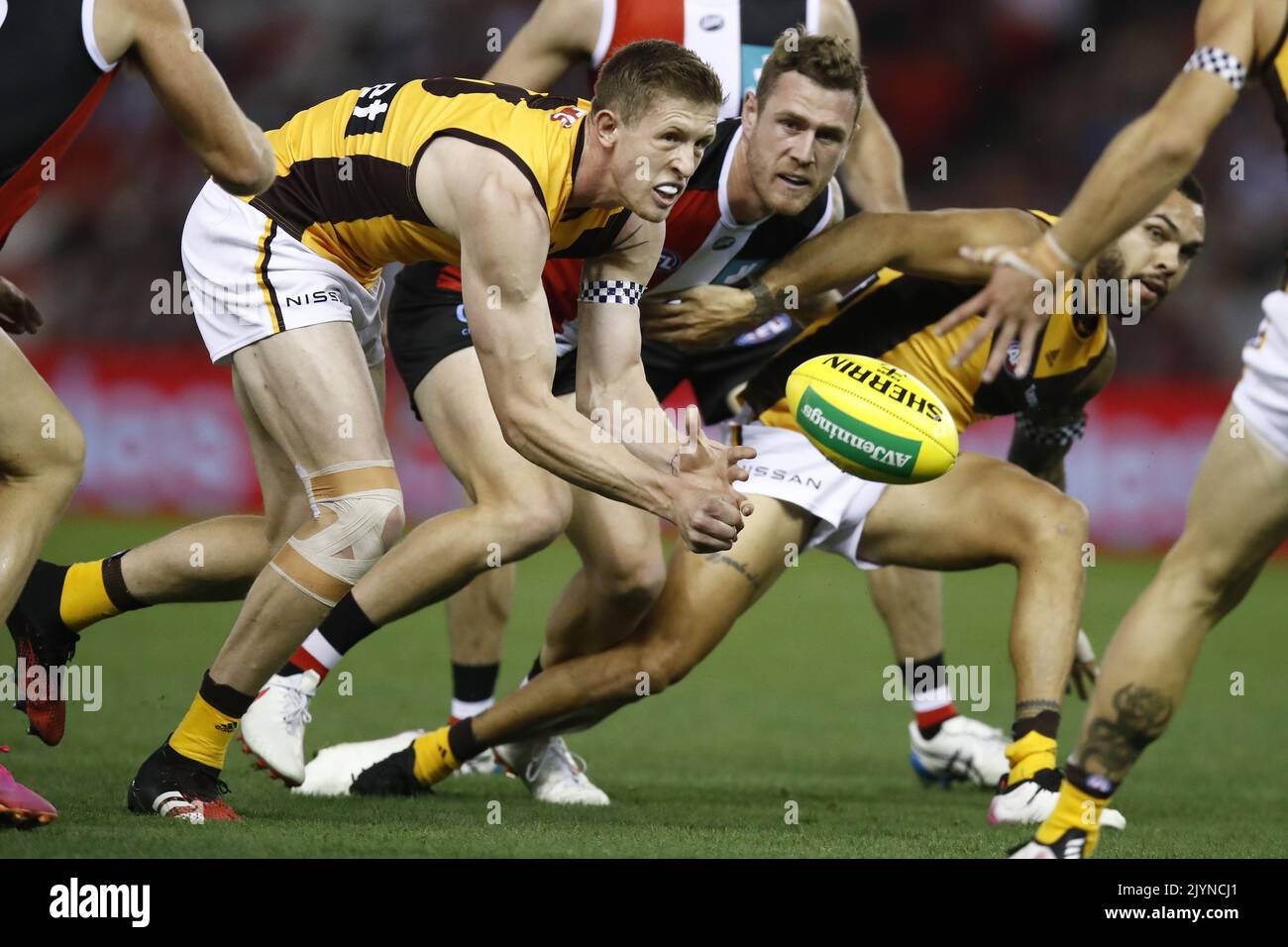 Sam Frost of the Hawks handballs during the Round 7 AFL match between ...