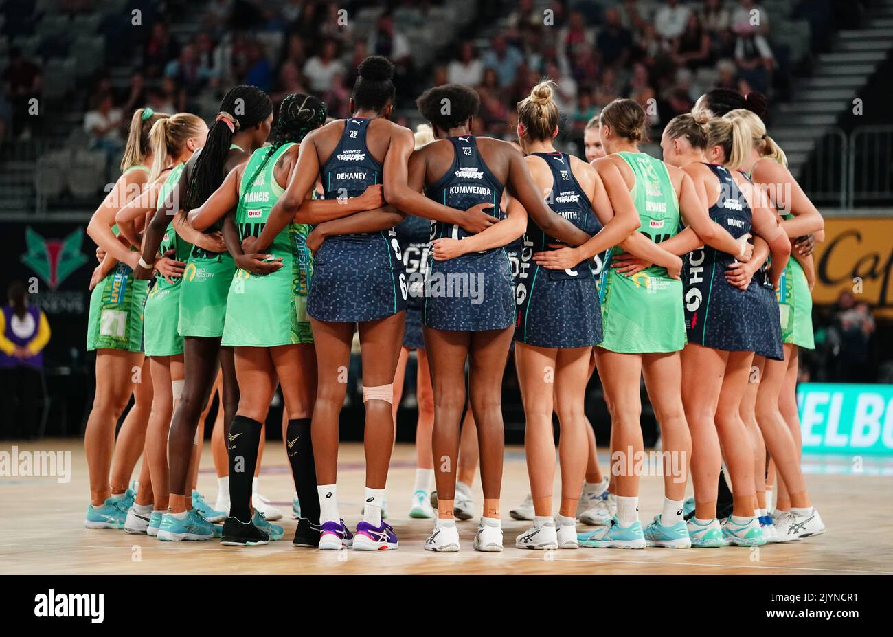 The two teams form a huddle after the Round 1 Super Netball match ...