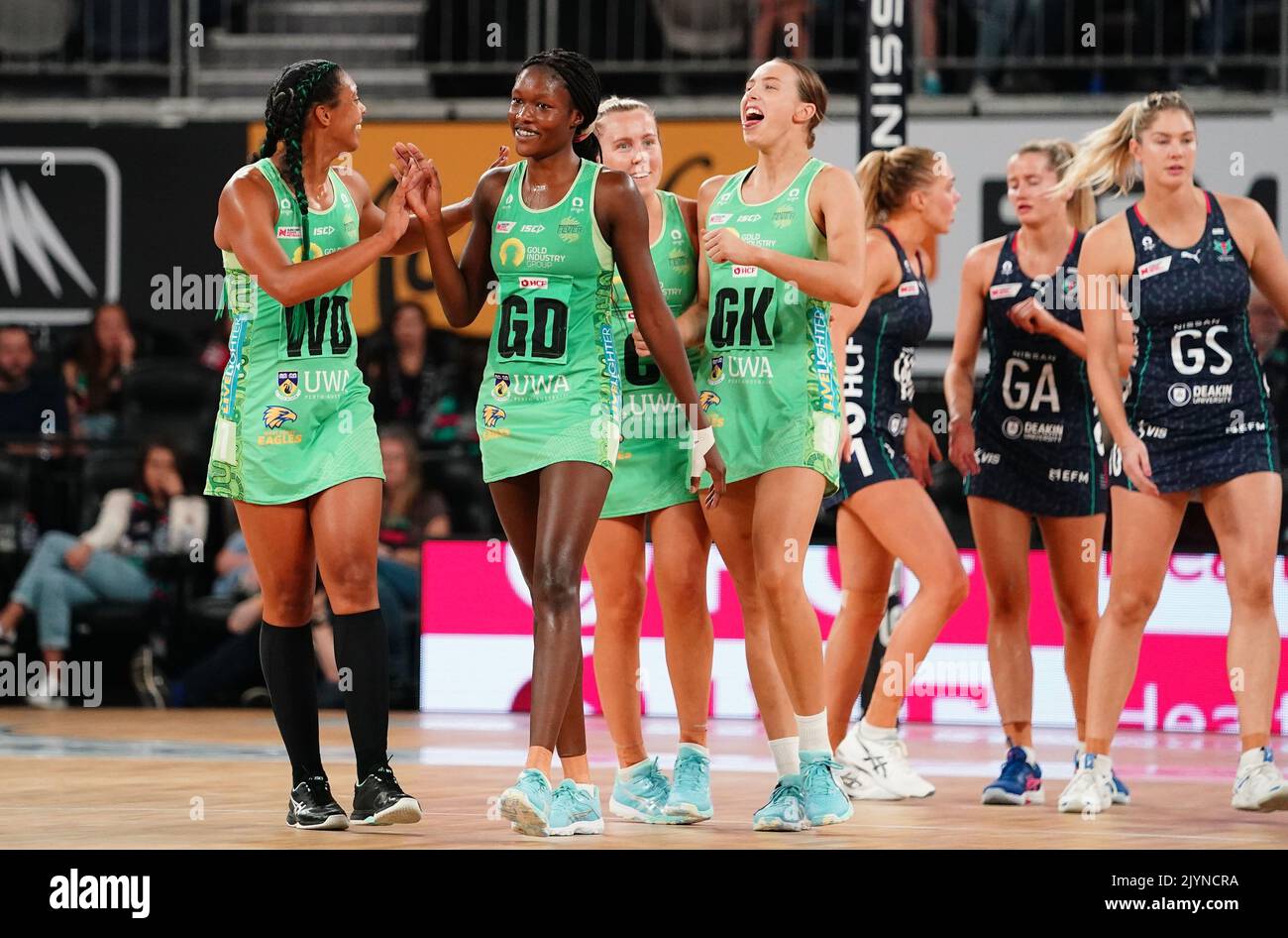 Stacey Francis and Sunday Aryang of the Fever celebrate during the ...