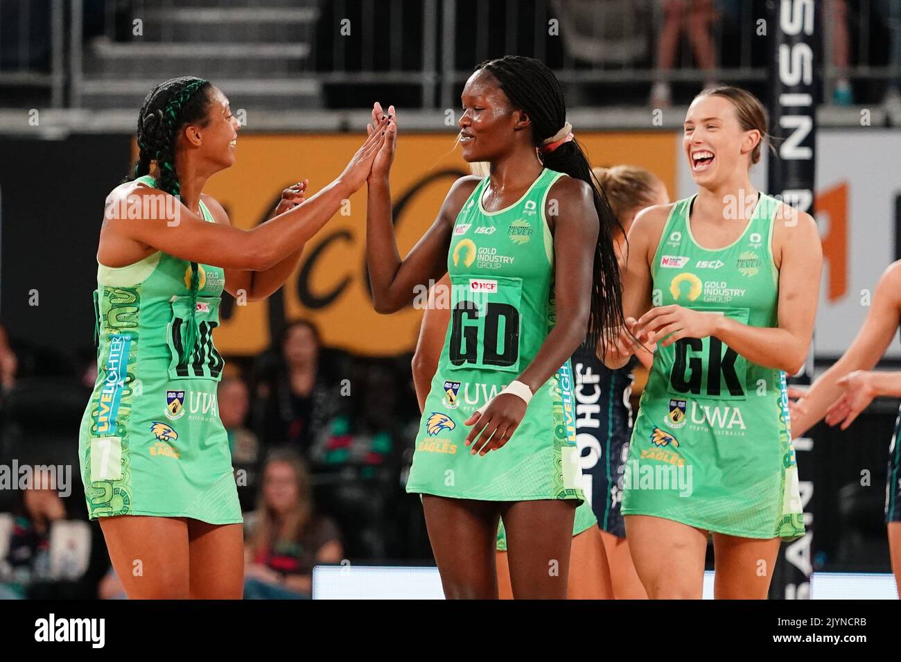 Stacey Francis and Sunday Aryang of the Fever celebrate during the ...