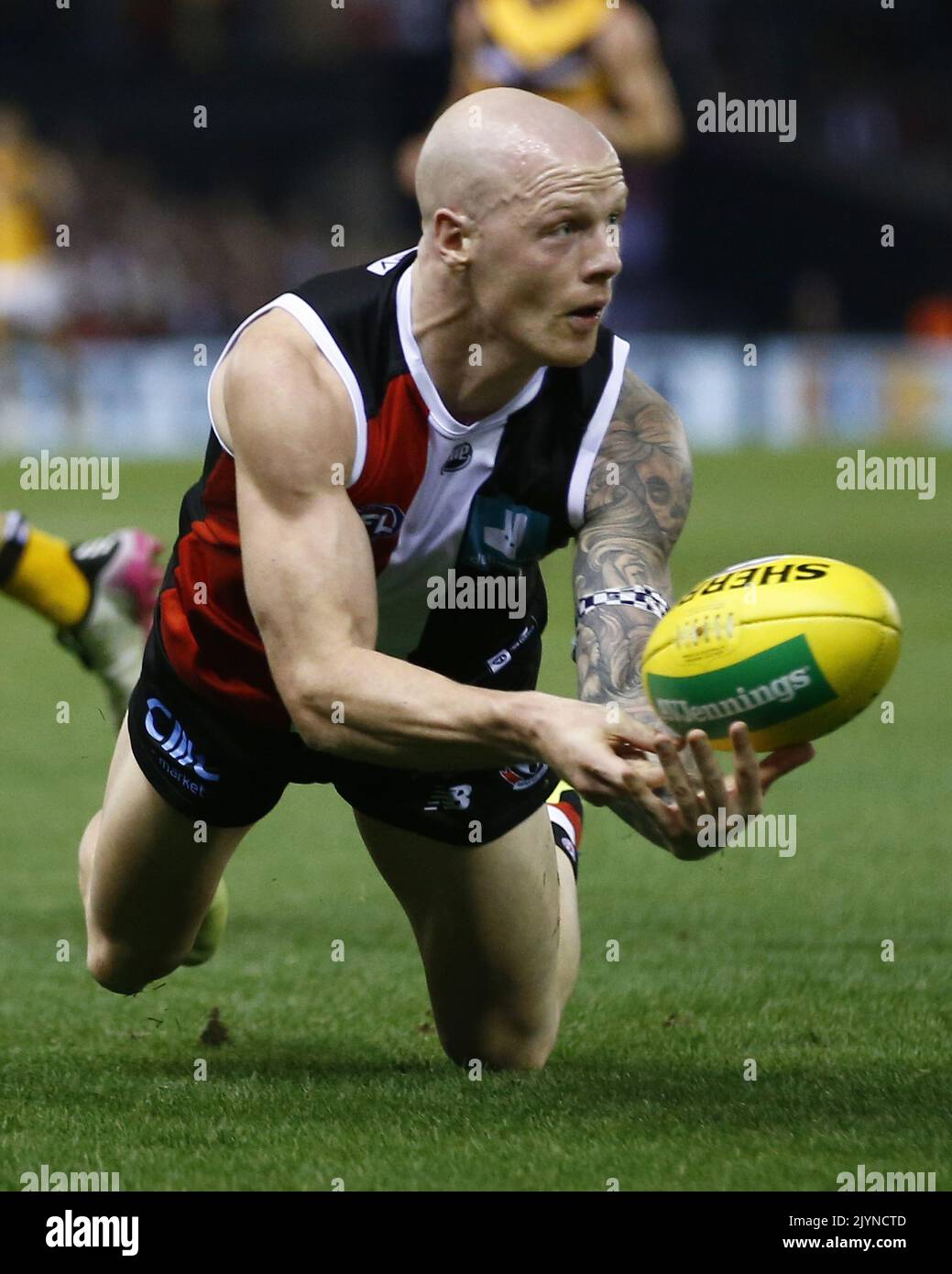 Zak Jones of the Saints handballs during the Round 7 AFL match between ...