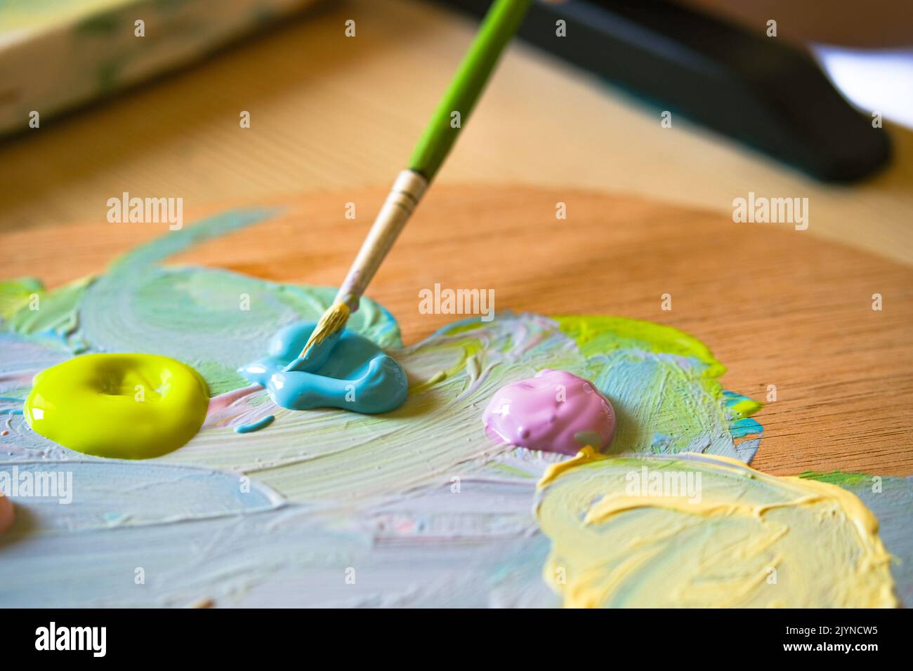 Paint brush in acrilic paint. Drawing lesson Stock Photo - Alamy