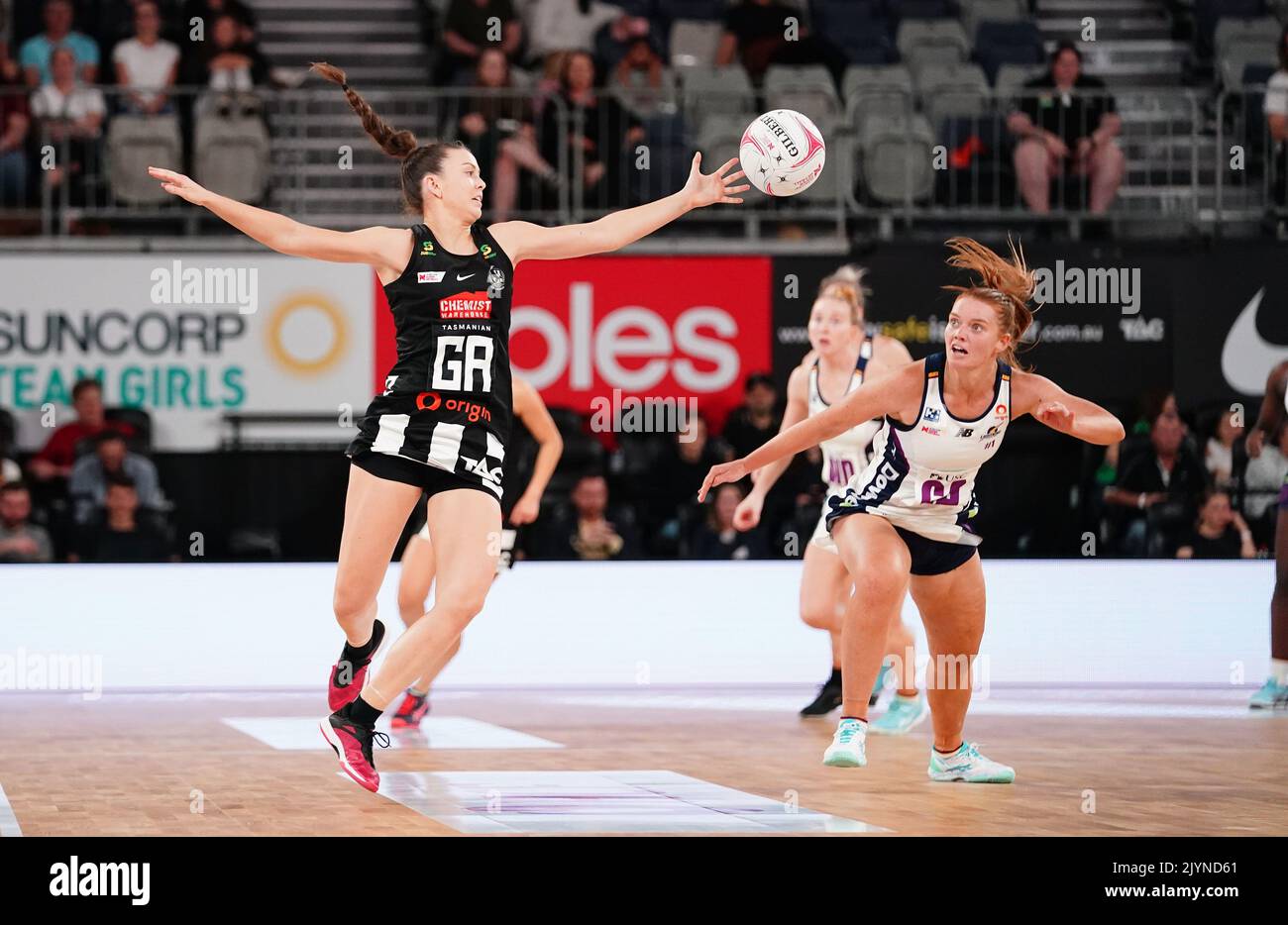 Gabby Sinclair of the Magpies and Steph Wood of the Lightning compete ...