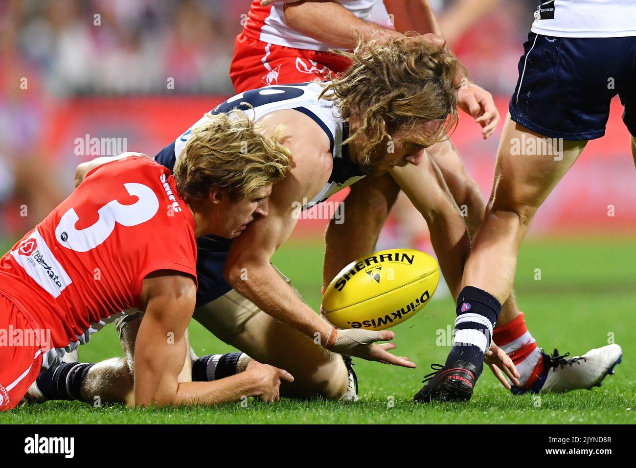 Cameron Guthrie of the Cats and Dylan Stephens of the Swans during the ...