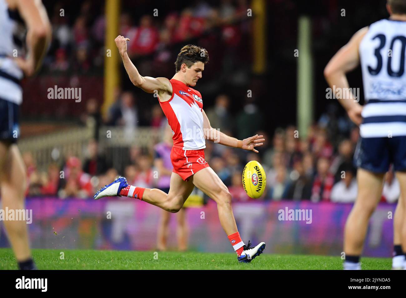 Errol Gulden of the Swans kicks a goal during the Round 7 AFL match ...