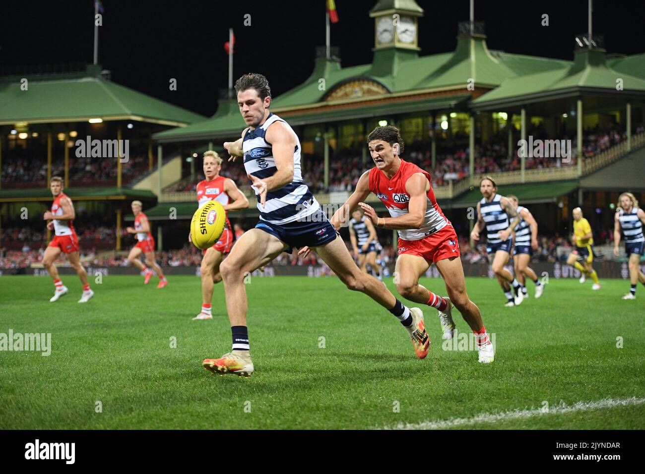 Isaac Smith of the Cats and Sam Wicks of the Swans during the Round 7 ...