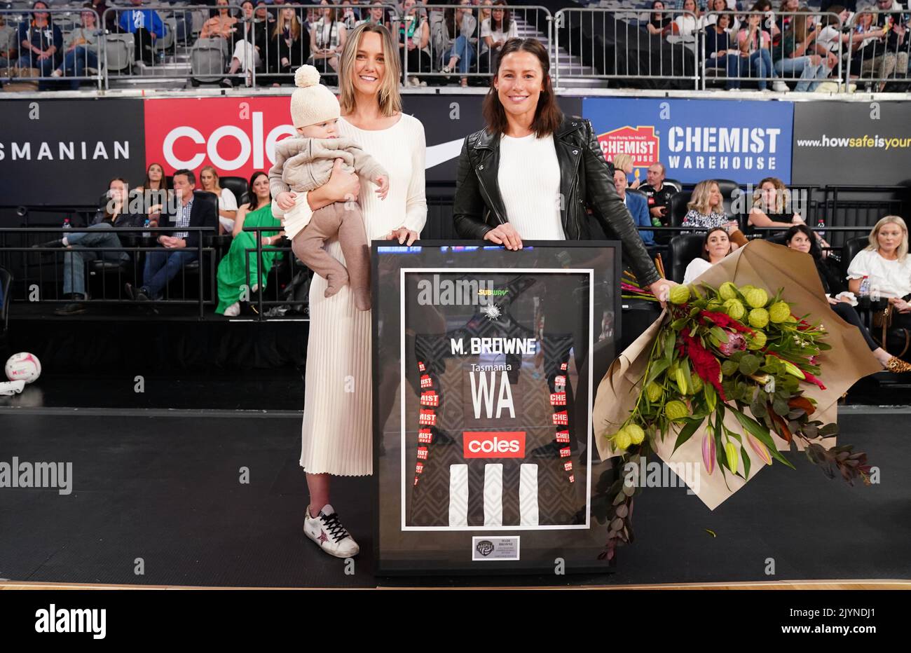 Retiring players Nat Medhurst and Madi Browne pose after their ...