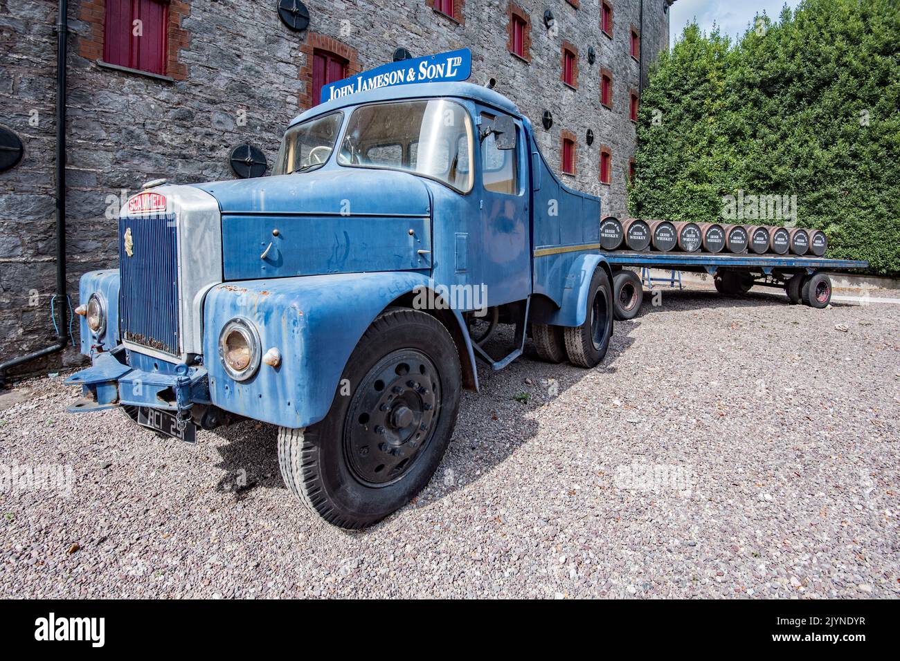 Vintage vehicle and old whiskey barrels at Jamesons Old Distillery at ...