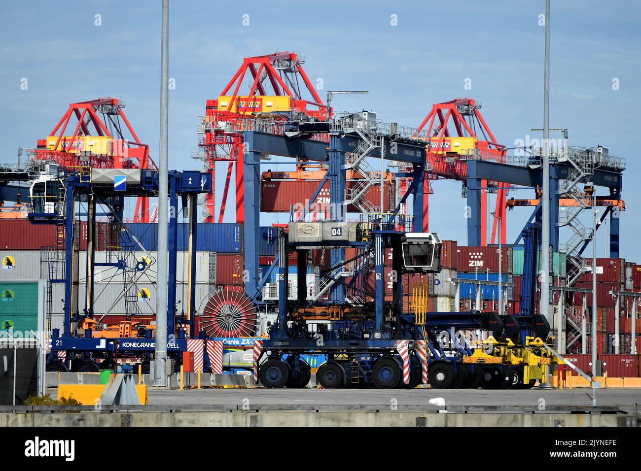 A container ship is unloaded at the Port Botany container terminal in ...