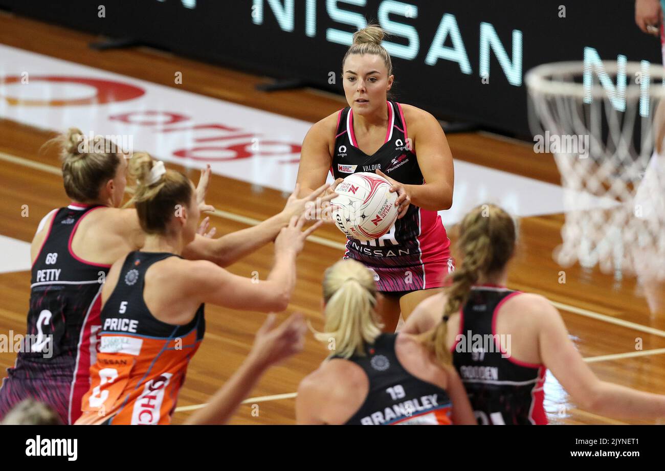 Elle McDonald of the Adelaide Thunderbirds looks to pass during the ...
