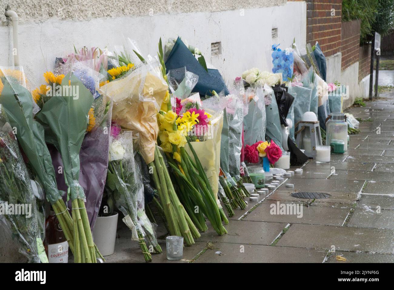 London, UK, 8 September 2022: Flowers and candles have been left on ...
