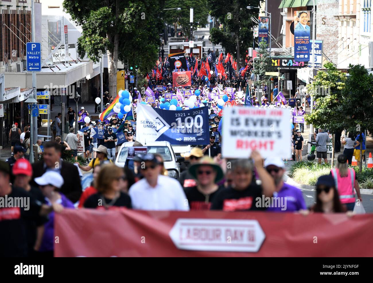 Union members and their supporters take part in the 2021 Labour Day ...