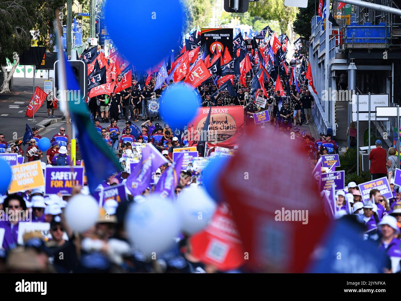 Union members and their supporters take part in the 2021 Labour Day ...