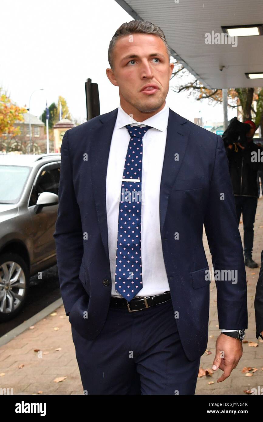 Former NRL player Sam Burgess (left) arrives with his lawyer Brian ...