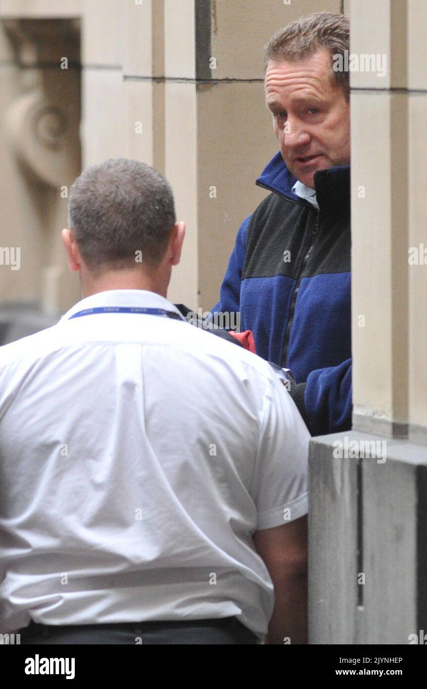 Geoffrey Armour is led into a prison van at the Supreme Court in ...