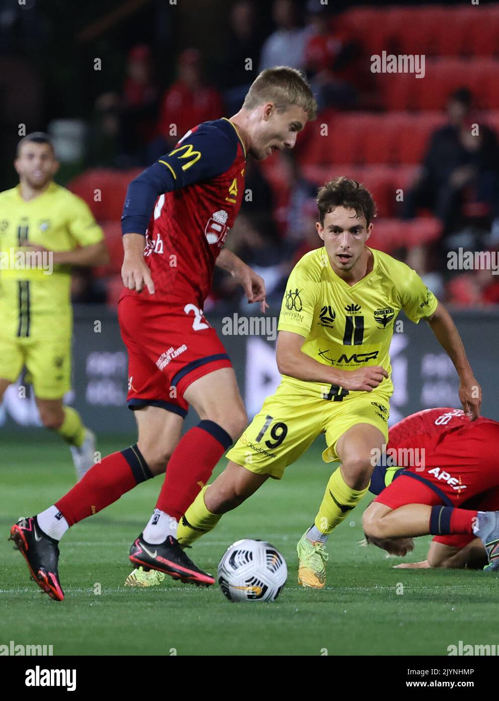 Benjamin Halloran of United and Sam Sutton of the Phoenix during the A ...