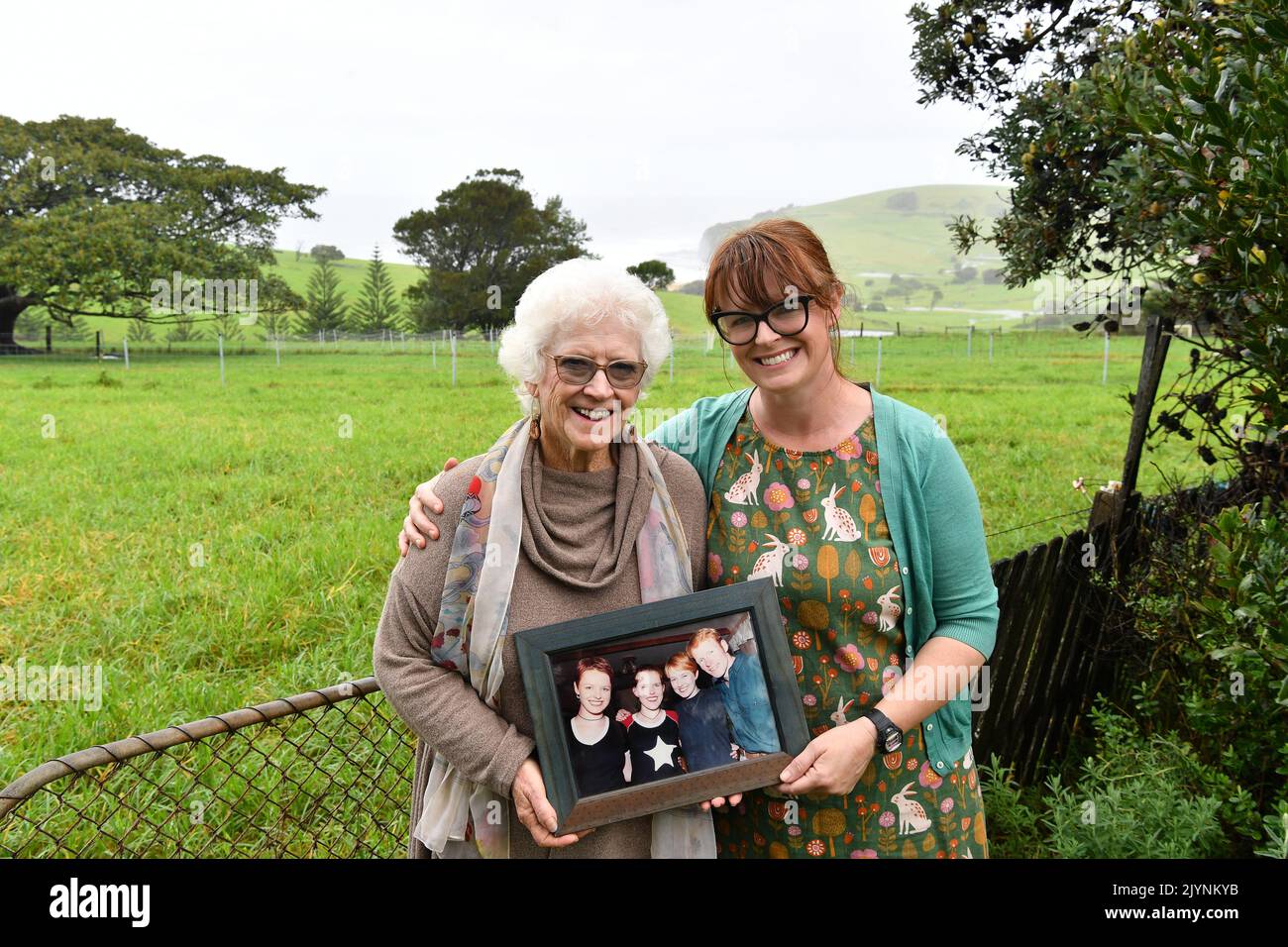 Fiona Walmsley with her mother Gay looks at a family portrait of Gay’s ...