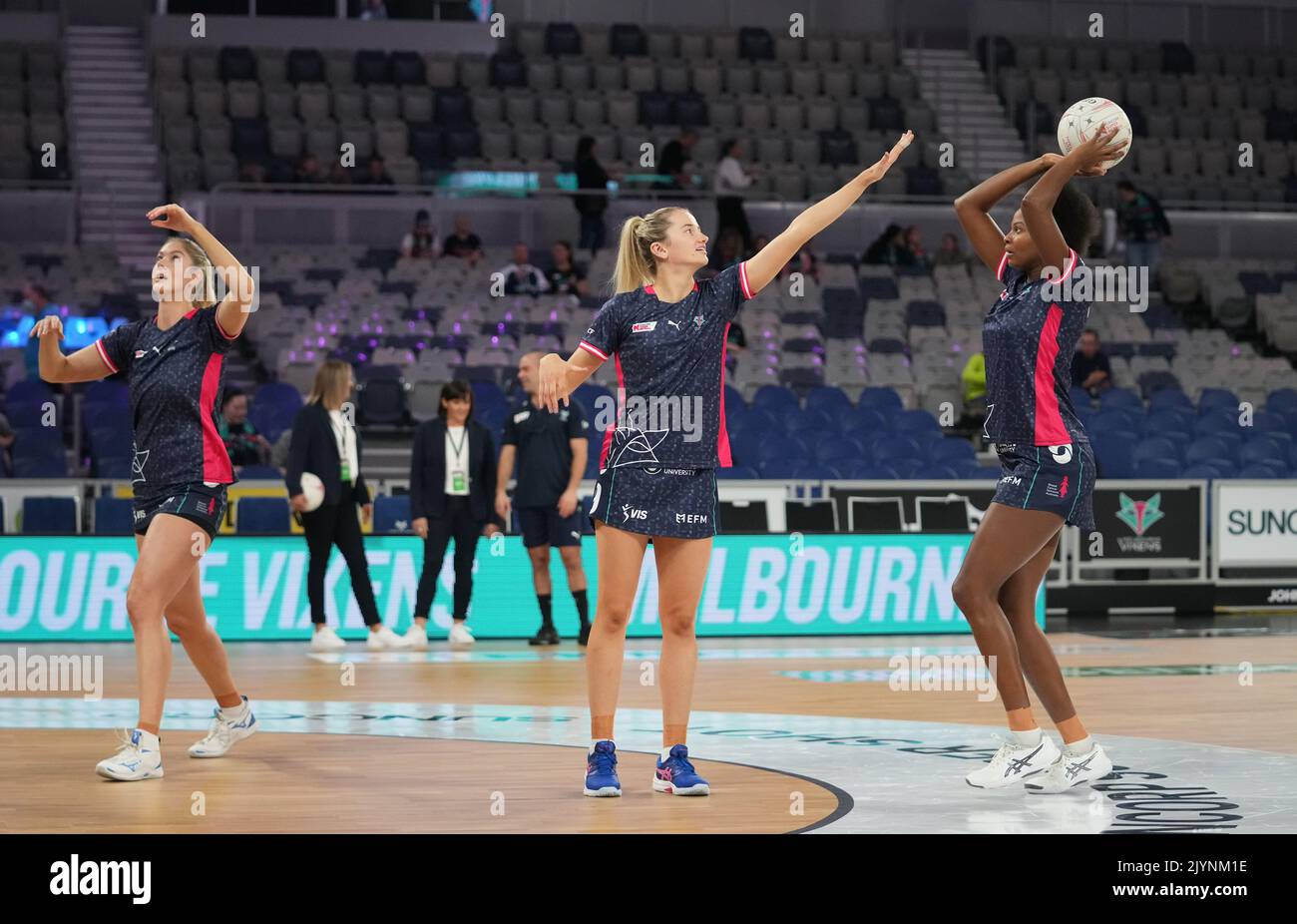 Ruby Barkmeyer of the Vixens and Mwai Kumwenda of the Vixens warm up ...