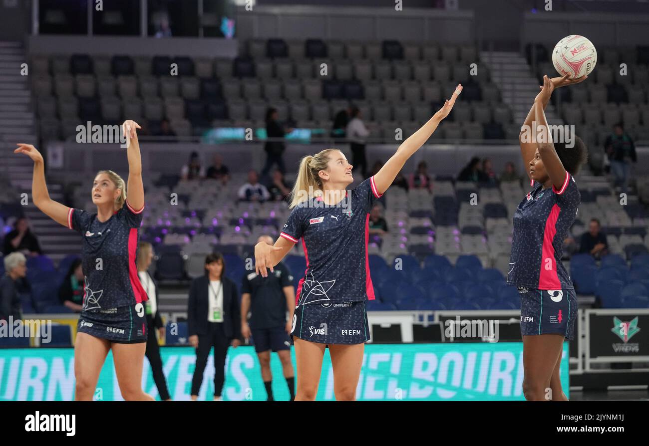 Ruby Barkmeyer of the Vixens and Mwai Kumwenda of the Vixens warm up ...