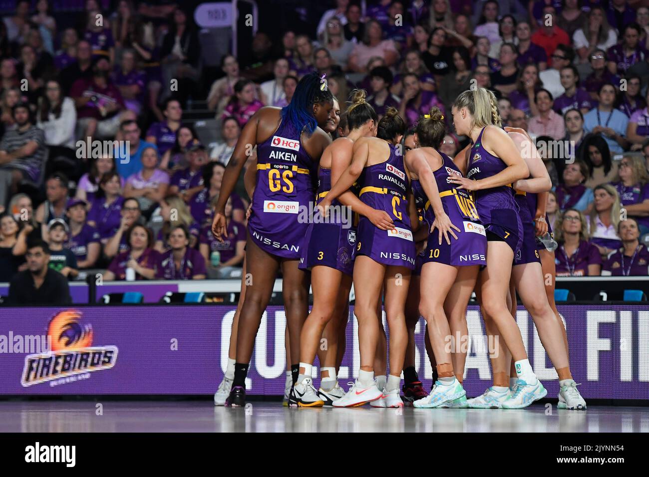 The Queensland Firebirds huddle during the Round 2 Super Netball match ...